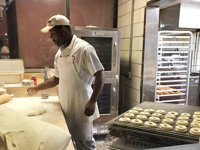 Behind the scenes, donut magic happens with practiced precision. This is craftsmanship you can taste in every bite.
