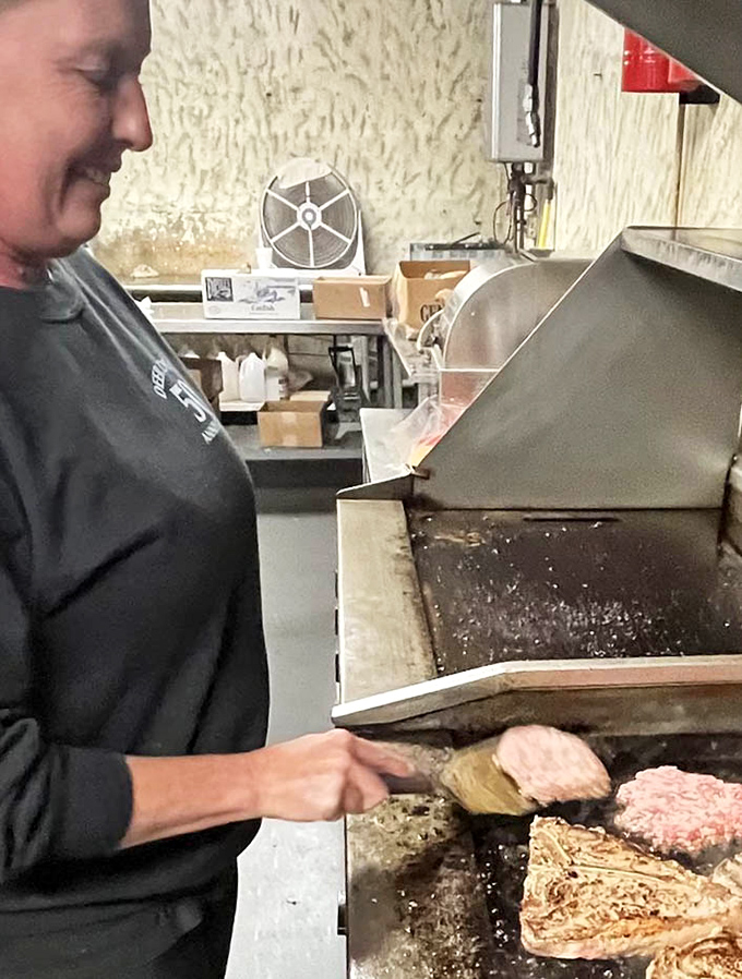 Where the magic happens: A glimpse into the kitchen reveals the well-seasoned grill that's been turning out perfect steaks for decades.
