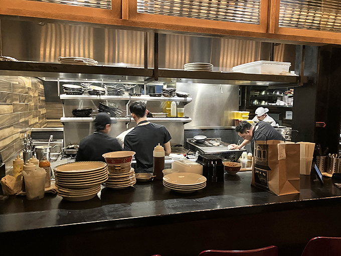 Where the magic happens&mdash;a glimpse into the bustling kitchen where culinary dreams become delicious reality. Organized chaos at its finest.