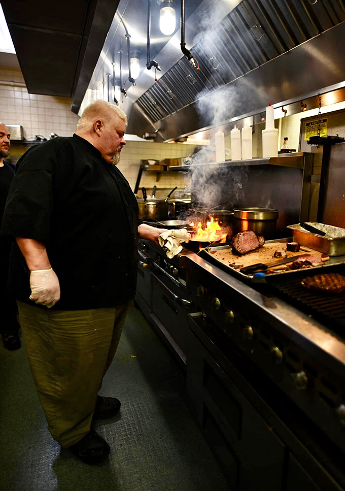 Where the magic happens&mdash;flames leap as the chef works his craft. Some call it cooking; I call it edible performance art with a side of history.