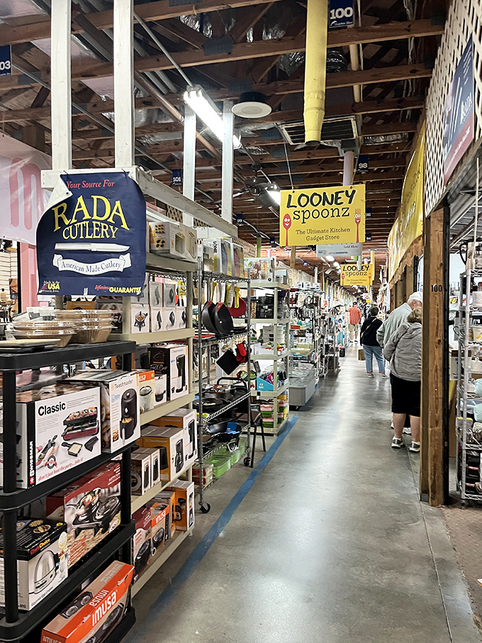 Kitchen gadget paradise stretches as far as the eye can see. From Rada cutlery to "Looney Spoonz," this aisle promises culinary adventures.