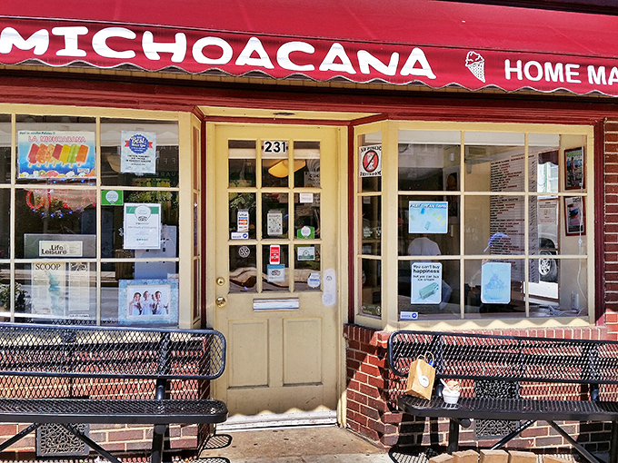 La Michoacana's vibrant storefront promises authentic flavors and homemade treats. Those benches outside have witnessed countless ice cream-induced smiles.