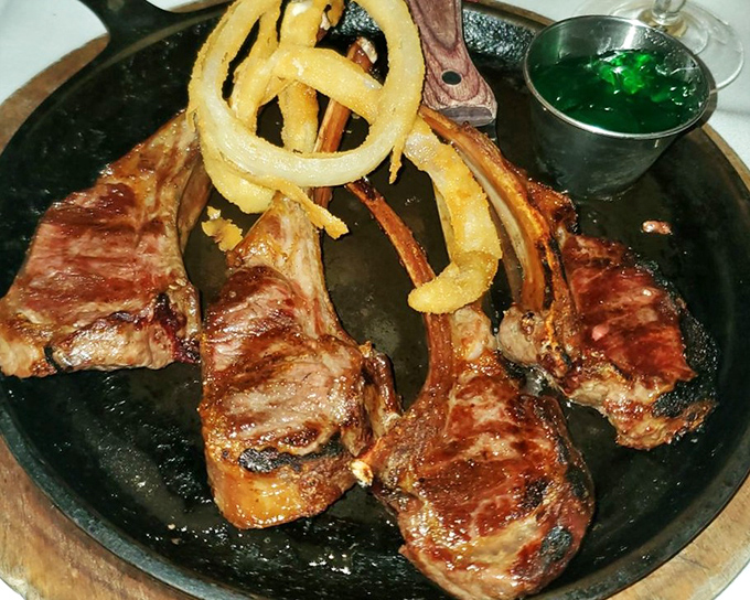 Lamb chops grilled to perfection prove this kitchen doesn't play favorites &ndash; excellence extends beyond beef alone.