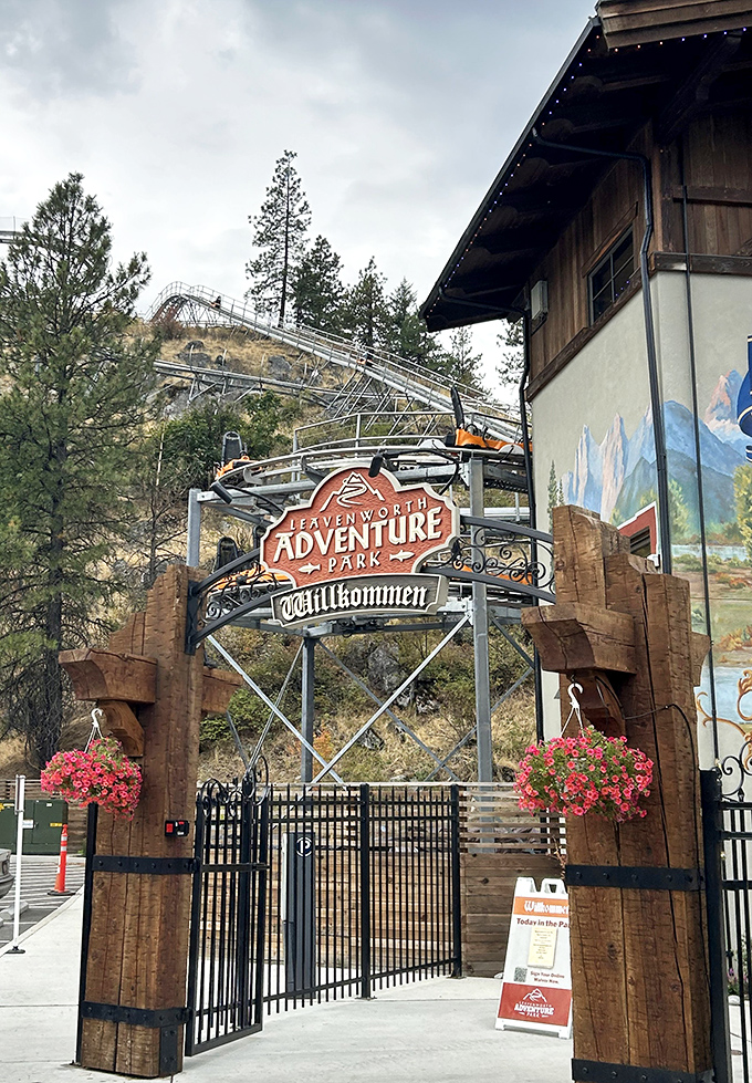 The Adventure Park entrance promises thrills with a Bavarian twist&mdash;because roller coasters are more fun when you can yell "Achtung!" at the first drop.
