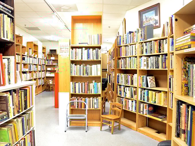 Floor-to-ceiling literary temptation awaits in aisles where forgotten bestsellers and obscure treasures sit side by side, waiting for rediscovery.