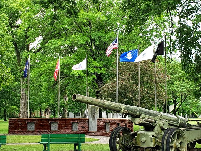 A military memorial stands proud in Logan Park, honoring those who served while providing a peaceful place for reflection.