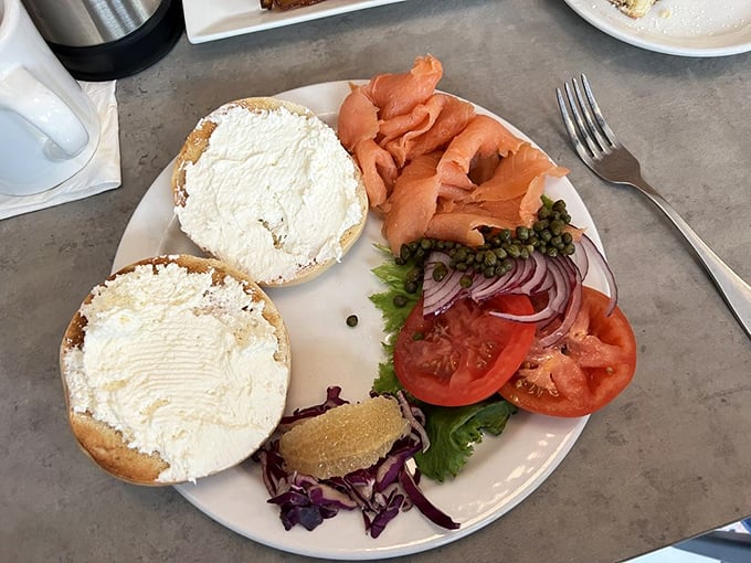The New York-Seattle cultural exchange: cream cheese-slathered bagels meet Pacific Northwest presentation. Those capers and red onions add pops of flavor to each bite.