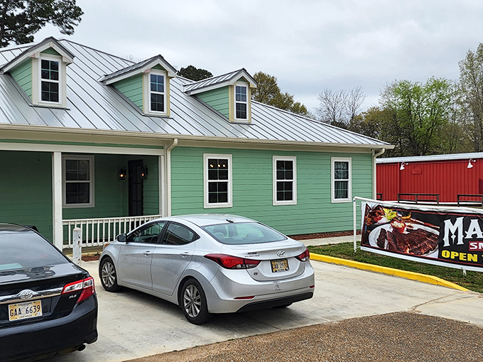The mint-green charm of Magnolia Smokehouse promises Southern comfort food that makes calorie-counting seem like a crime against humanity.
