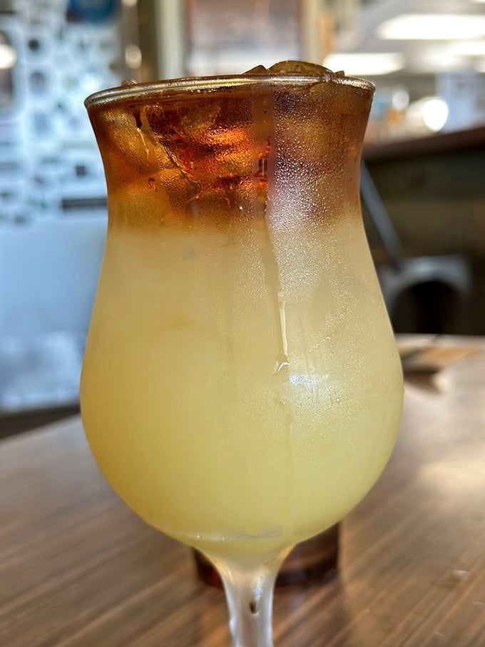This golden-to-amber gradient cocktail isn't just a drink&mdash;it's a sunset in a glass that whispers "slow down" with every sip.