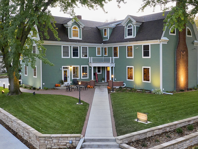 The Main Street Inn welcomes visitors with architectural charm that whispers "stay awhile" rather than shouting "we have free Wi-Fi."