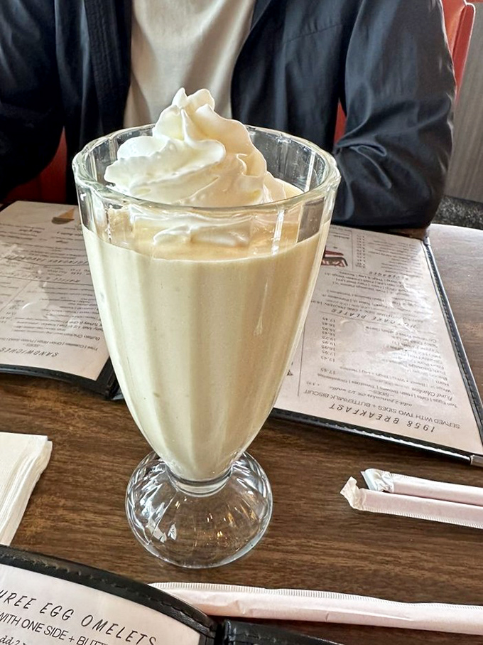 A milkshake so thick it defies gravity&mdash;where whipped cream meets vanilla perfection in a glass that belongs in the dessert hall of fame.