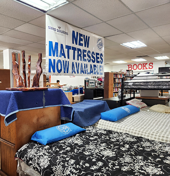 "NEW MATTRESSES NOW AVAILABLE"—because even thrift store devotees draw the line somewhere. Smart move, St. Vincent's.