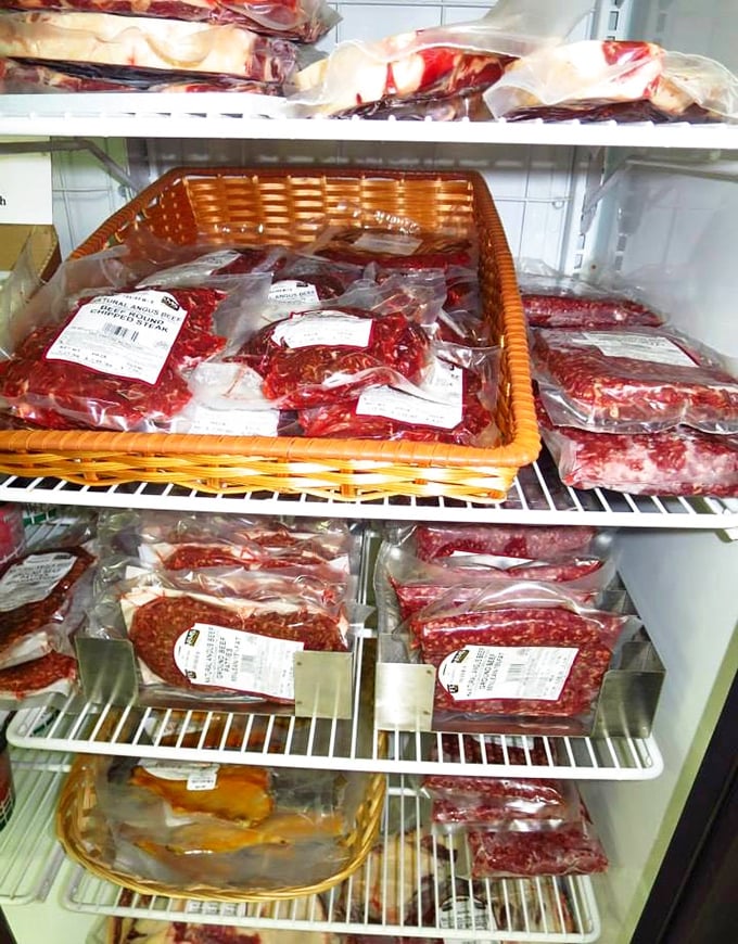Carnivore heaven! Farm-raised meats fill these refrigerated shelves, proving that knowing where your dinner comes from makes it taste that much better.