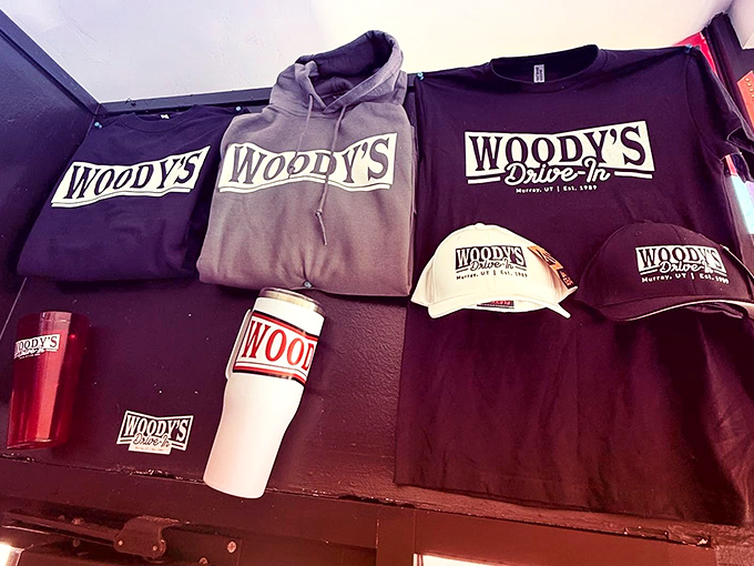 When a restaurant's merch wall looks this good, you know the food must be legendary. Wear your Woody's pride like the badge of honor it is!