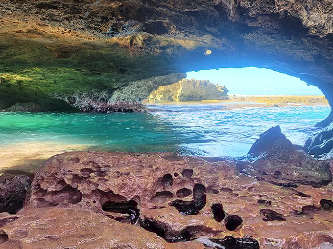 Mermaids Cave opens to reveal nature's perfect window frame, where the ocean creates an ever-changing masterpiece of blue and green.