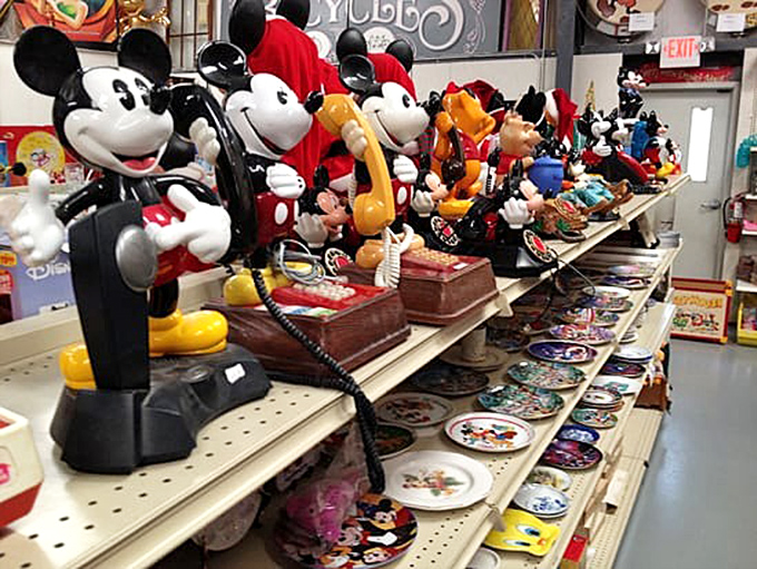 Disney nostalgia corner: where childhood memories and collectible Mickey phones stand at attention, ready for their next performance.