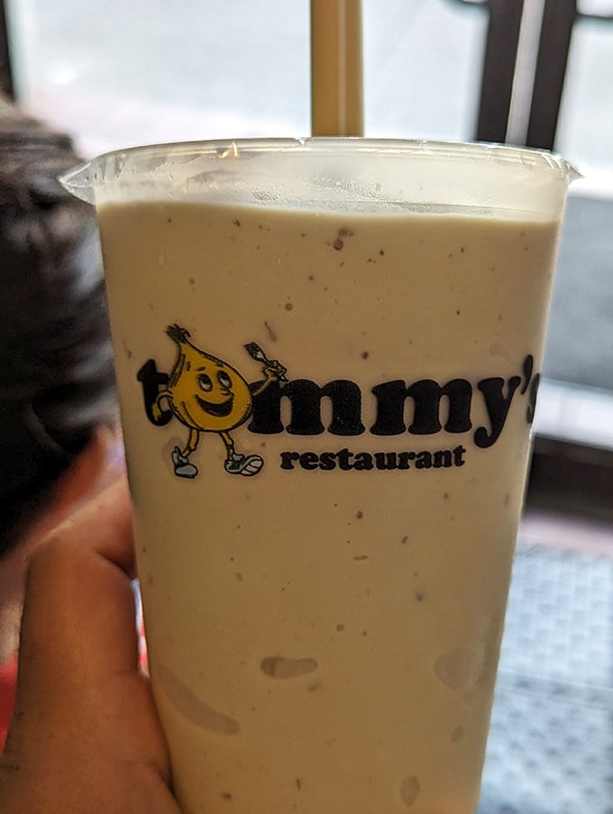 Tommy's logo grins from a milkshake so thick it defies physics &ndash; this isn't a drink, it's dessert with aspirations of mobility.
