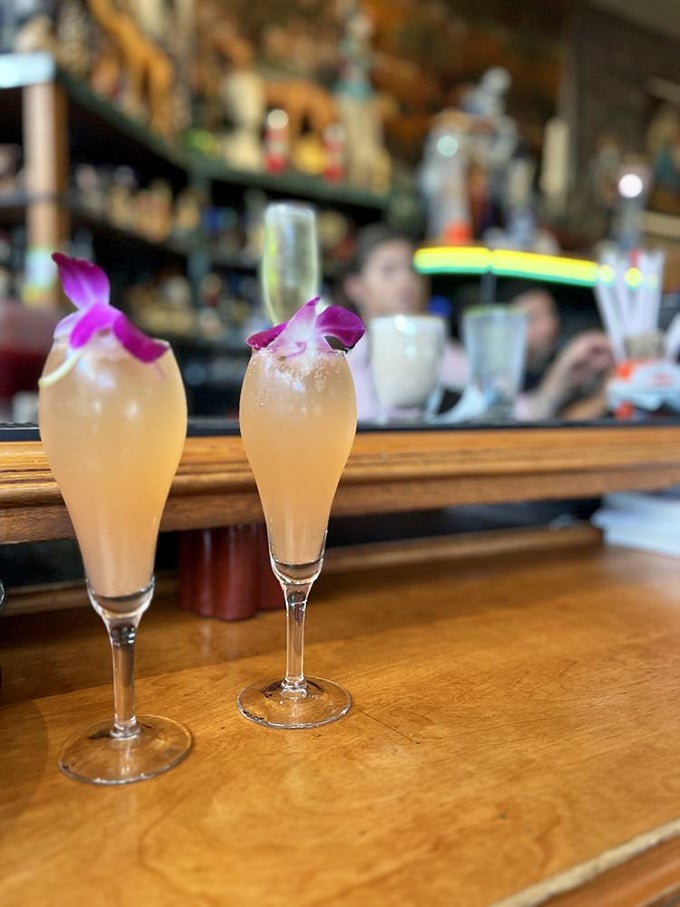 Mimosas adorned with orchids&mdash;because sometimes breakfast needs jewelry too. Champagne bubbles never had it so fancy.