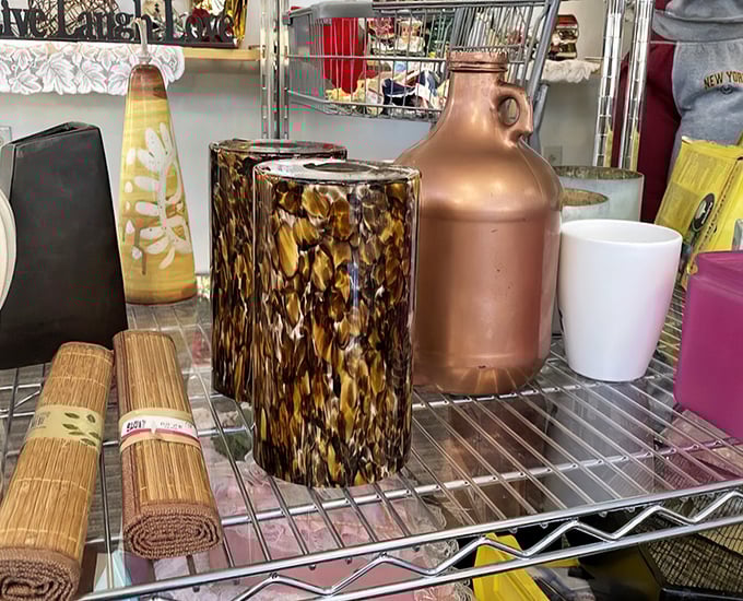 Vases and containers standing at attention like architectural students showing off their final projects. That copper jug deserves an A+.