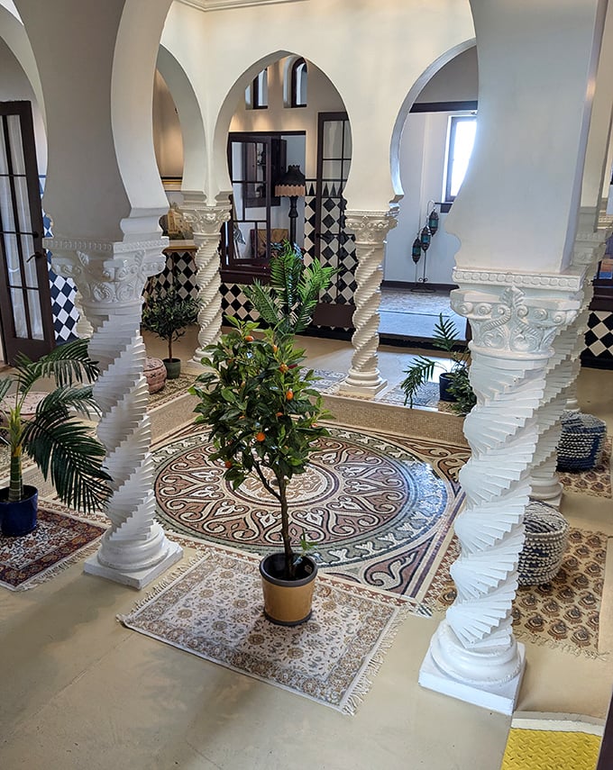 White columns and mosaic floors create an interior courtyard that makes you forget the Mississippi River is outside.