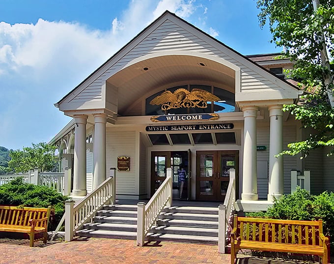 Mystic Seaport's welcoming entrance promises maritime adventures without the scurvy, seasickness, or other inconveniences that plagued actual 19th-century sailors.