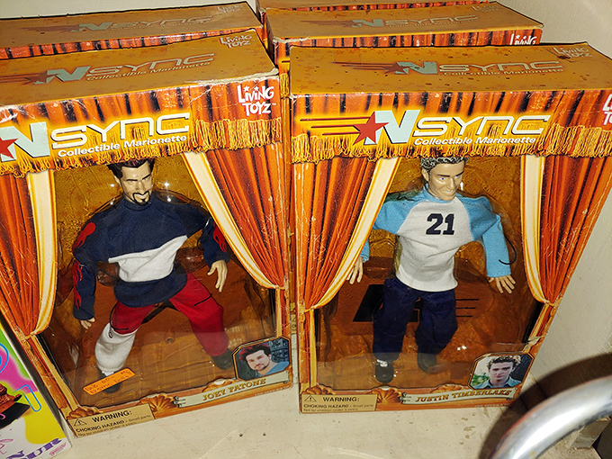NSYNC dolls frozen in time, waiting for someone to say "Bye Bye Bye" to their money.