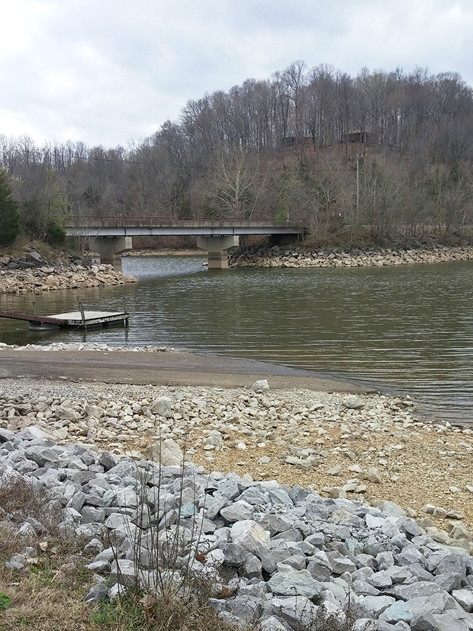 Neal Bridge spans quiet waters where fishing stories grow taller with each telling and the pace of life flows as gently as the stream below.