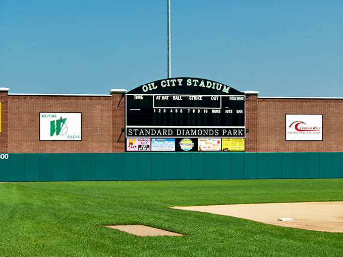 Oil City Stadium's scoreboard stands ready to chronicle the triumphs and heartbreaks of summer baseball under Indiana skies.