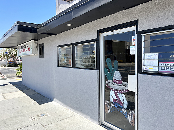 Olvera's unassuming exterior hides culinary treasures within, complete with a sombrero-wearing cactus that practically winks at passersby.