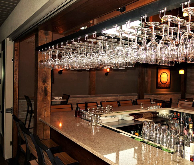 Wine glasses hanging like crystal stalactites&mdash;a boozy cave of wonders where your next favorite vintage is just waiting to be discovered.