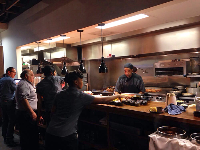 Barbecue as theater&mdash;the open kitchen lets you witness the magic. Like watching Olympic athletes, except these folks work with fire and meat.