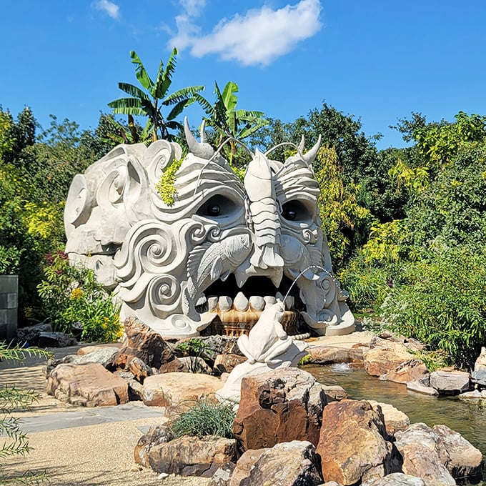 This fantastical stone creature looks like it wandered off a movie set and decided the garden was a perfect retirement spot.
