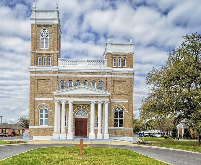 Our Lady of the Gulf Catholic Church reaches skyward with twin towers. Spiritual elevation with a side of architectural magnificence.