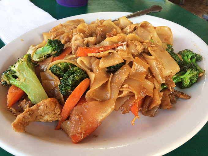 Pad See Ew with perfectly charred noodles and vibrant vegetables. It's what would happen if comfort food went to finishing school.