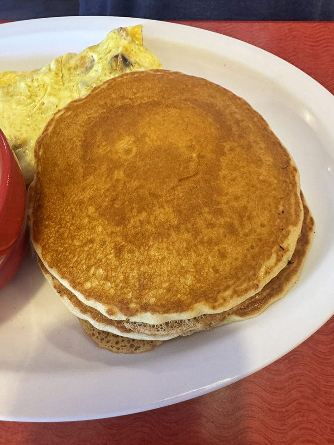 Those pancakes are stacked higher than my weekend to-do list, and infinitely more appealing.