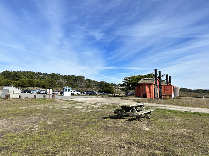 The humble parking area promises adventure beyond its borders, like the modest cover of a book containing epic tales.