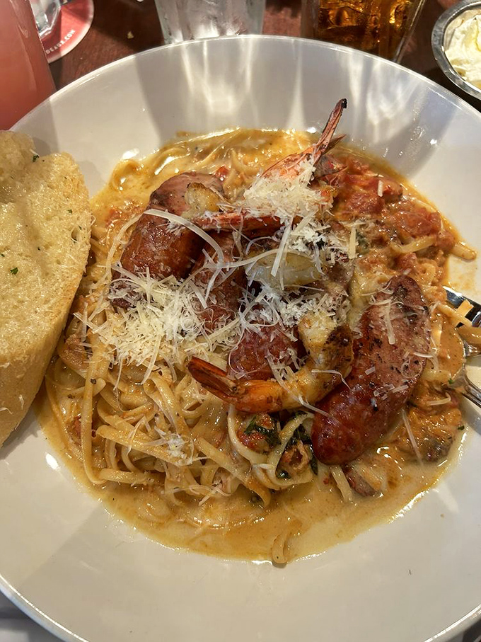 Pasta that's having a Mardi Gras of its own, where noodles dance with shrimp and sausage in a sauce that deserves a parade.