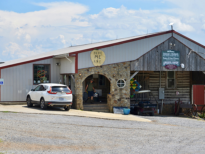 Stone pathways and vibrant flowers create an entrance that says "welcome" better than any doormat. Nature and architecture in perfect harmony. 