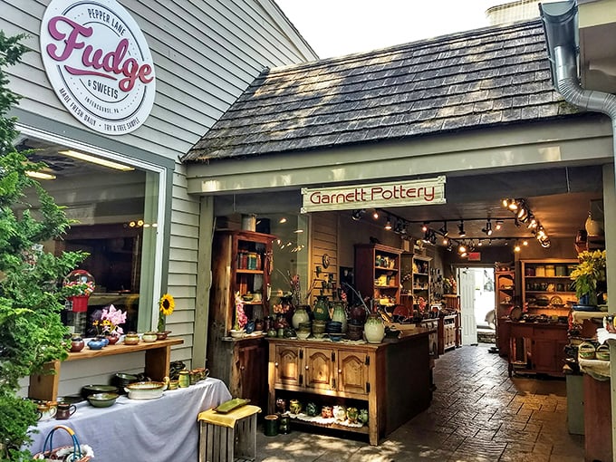 Sweet temptations and handcrafted pottery share space in this cozy shop. The warm lighting inside promises treasures that are as pleasing to the touch as they are to the eye.