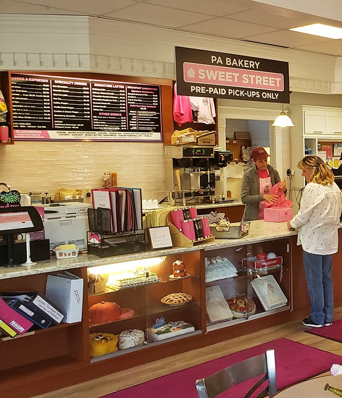 The "Sweet Street" counter&mdash;where dreams come true and pink boxes become treasure chests of joy to take home.