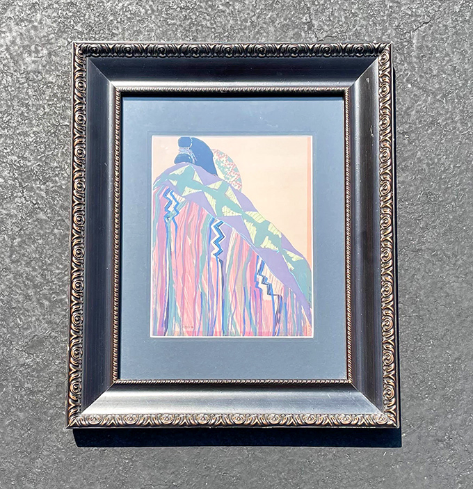 Art that once adorned another's walls now waits for your appreciation. This framed piece could be the missing element in your hallway gallery.