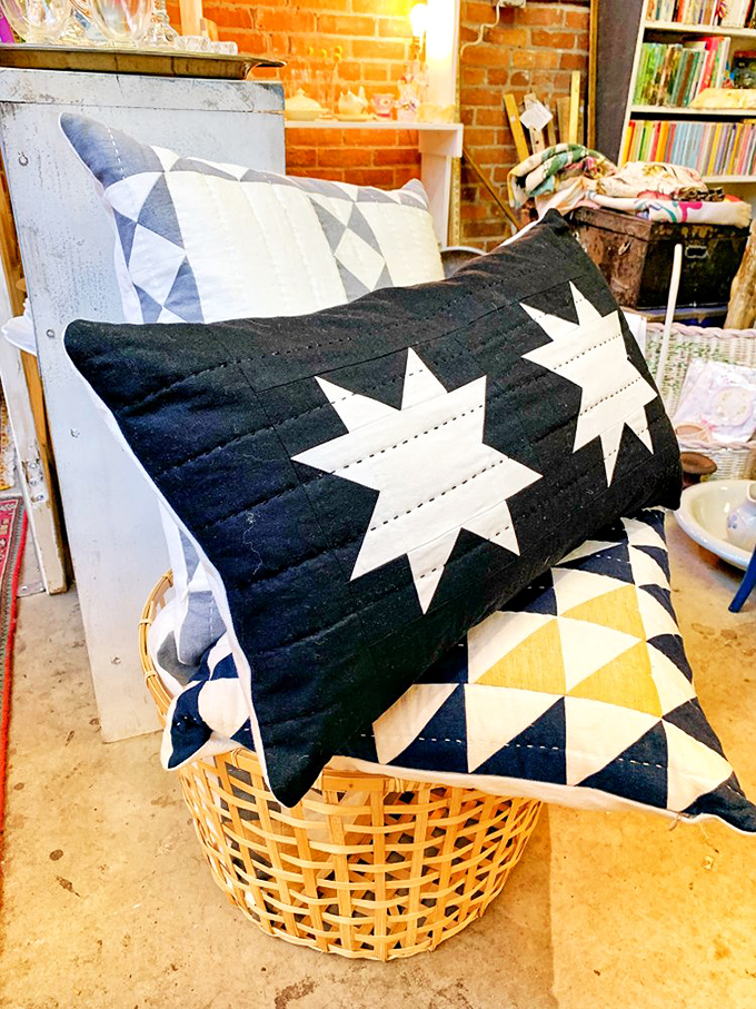 Handcrafted quilted pillows with geometric patterns that would make your modern designer sofa instantly more interesting&mdash;and your wallet happier.