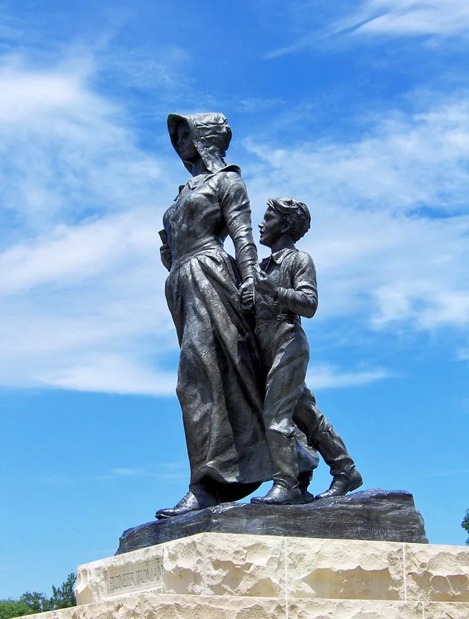 The Pioneer Woman statue celebrates the strength of those who built lives on the prairie with determination.