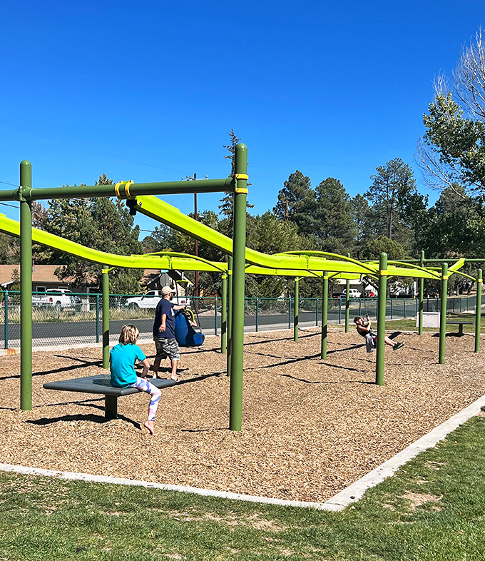The playground equipment at Show Low City Park proves you don't need expensive entertainment when you've got fresh mountain air and affordable living.