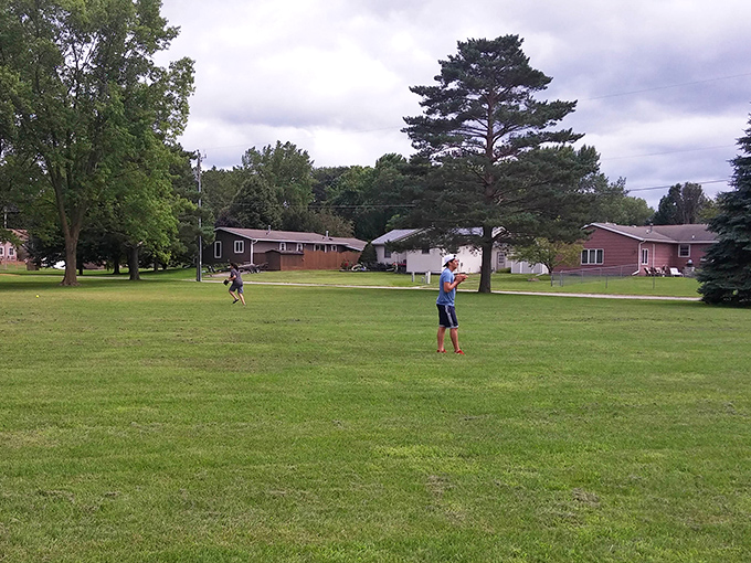 Nothing says "I'm on vacation" quite like tossing a frisbee in a park where the grass feels specifically designed for bare feet.