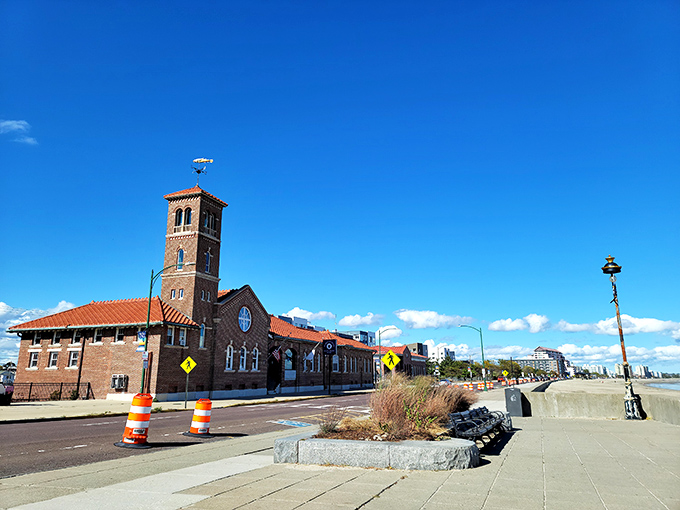 The distinctive clock tower of the Revere Beach station stands as an architectural exclamation point against the coastal landscape.