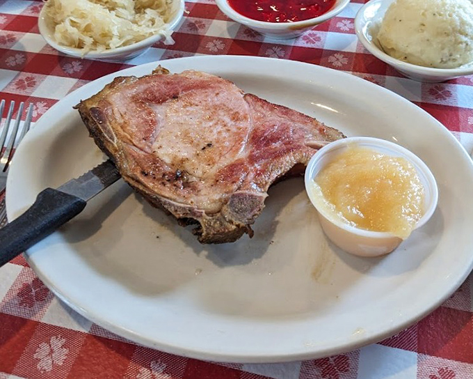 A pork chop that makes you understand why Iowa takes its pork so seriously. That applesauce companion isn't just a garnish&mdash;it's a perfect marriage.