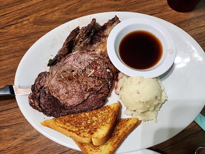 A bone-in prime rib this massive requires strategy, determination, and possibly a nap afterward for proper digestion.
