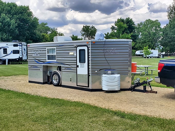 Home is where you park it: This gleaming silver sanctuary proves camping doesn't mean sacrificing your morning coffee comfort.