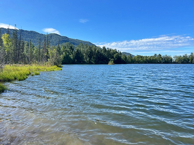 Reflections Lake mirrors the surrounding mountains with such perfection you'll wonder which way is up. Nature's own infinity pool awaits.